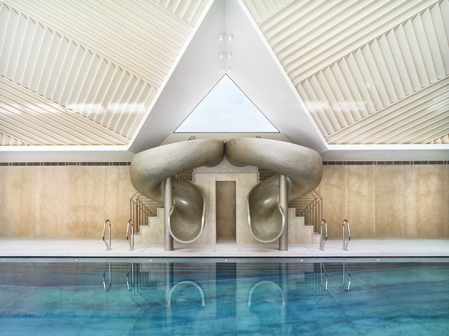 Sculptural Pool Slide Design | Tryst by Splinterworks
