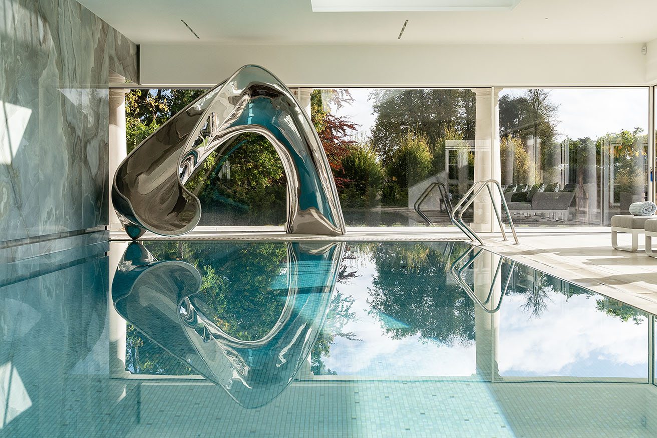 Sculptural Stainless Steel Pool Slide | Vertex by Splinterworks