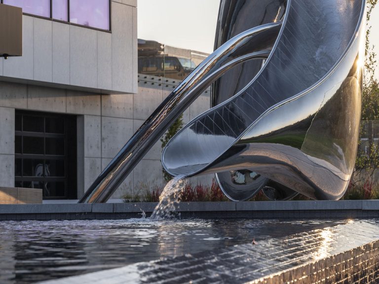 Sculptural Pool Slide Design | Tryst by Splinterworks