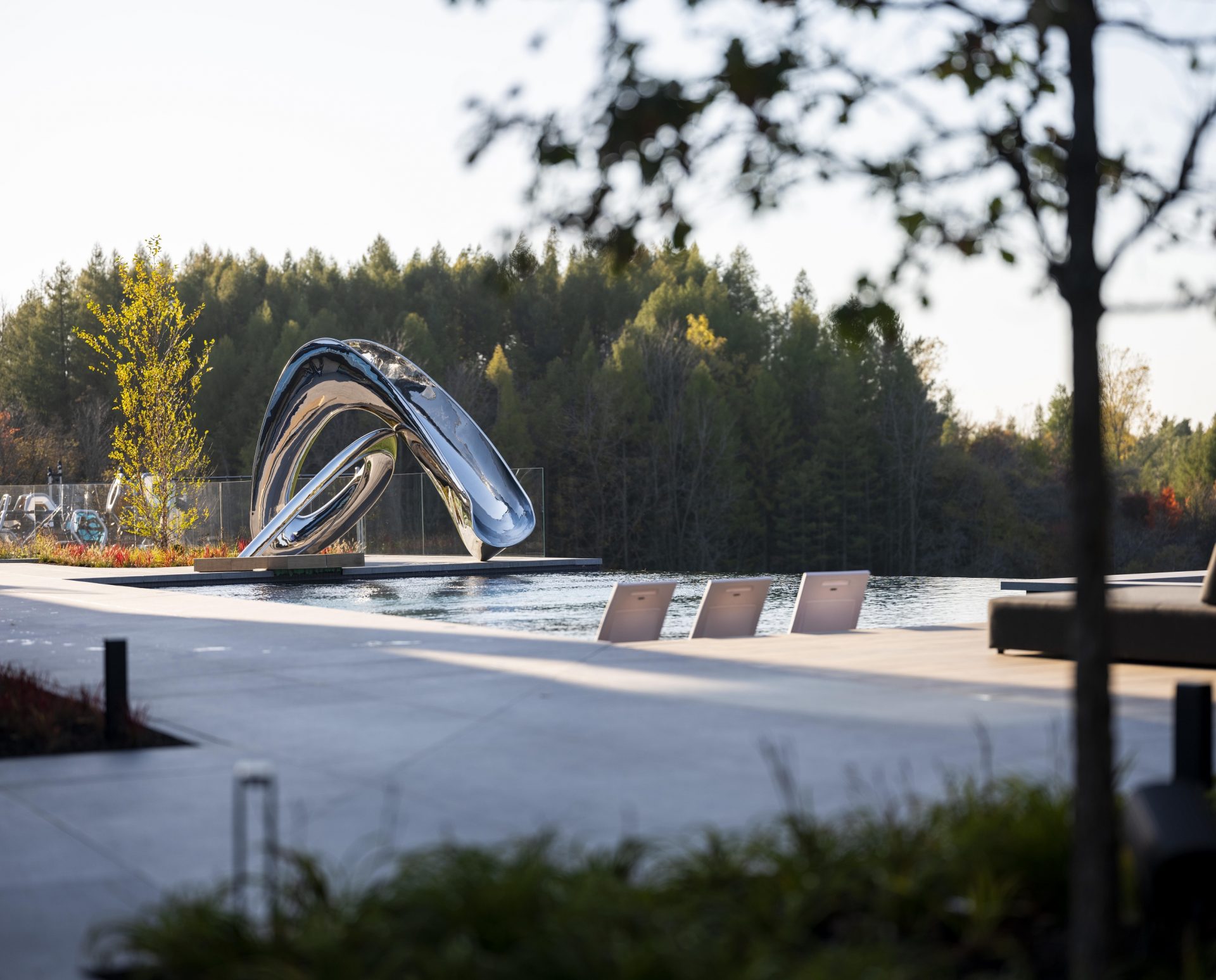 Sculptural Pool Slide Design | Tryst by Splinterworks