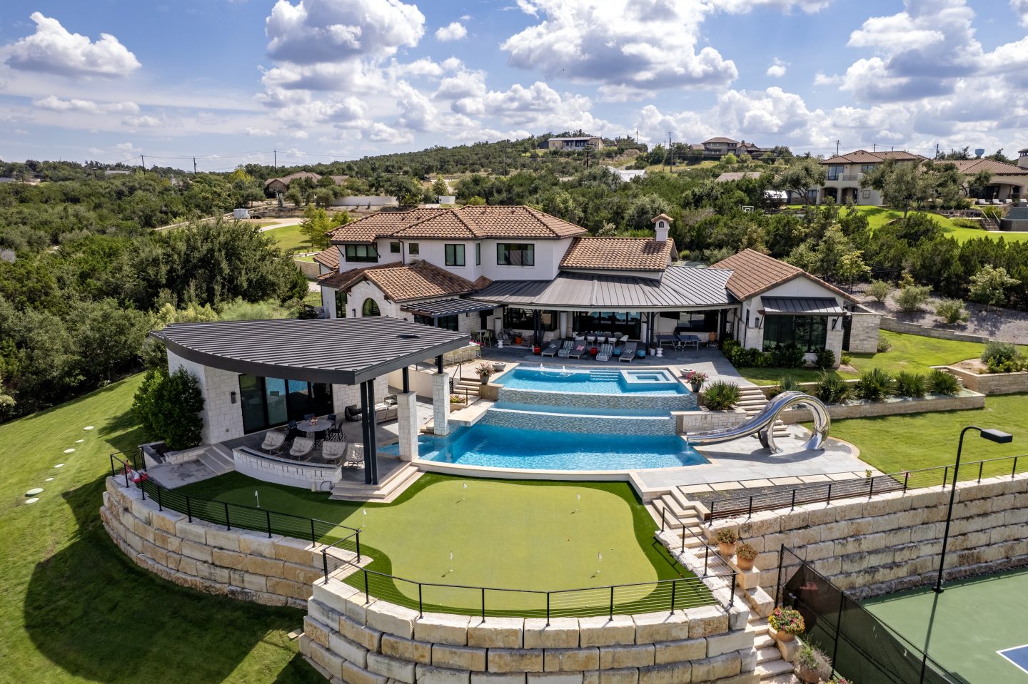 Halo | cantilevered pool slide | by Splinterworks