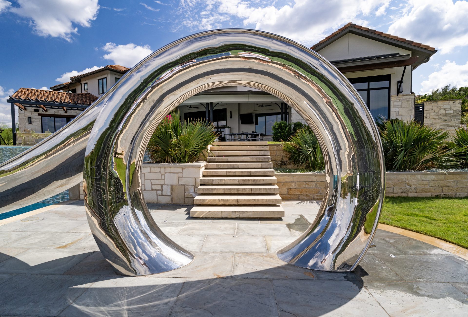 Halo | cantilevered pool slide | by Splinterworks