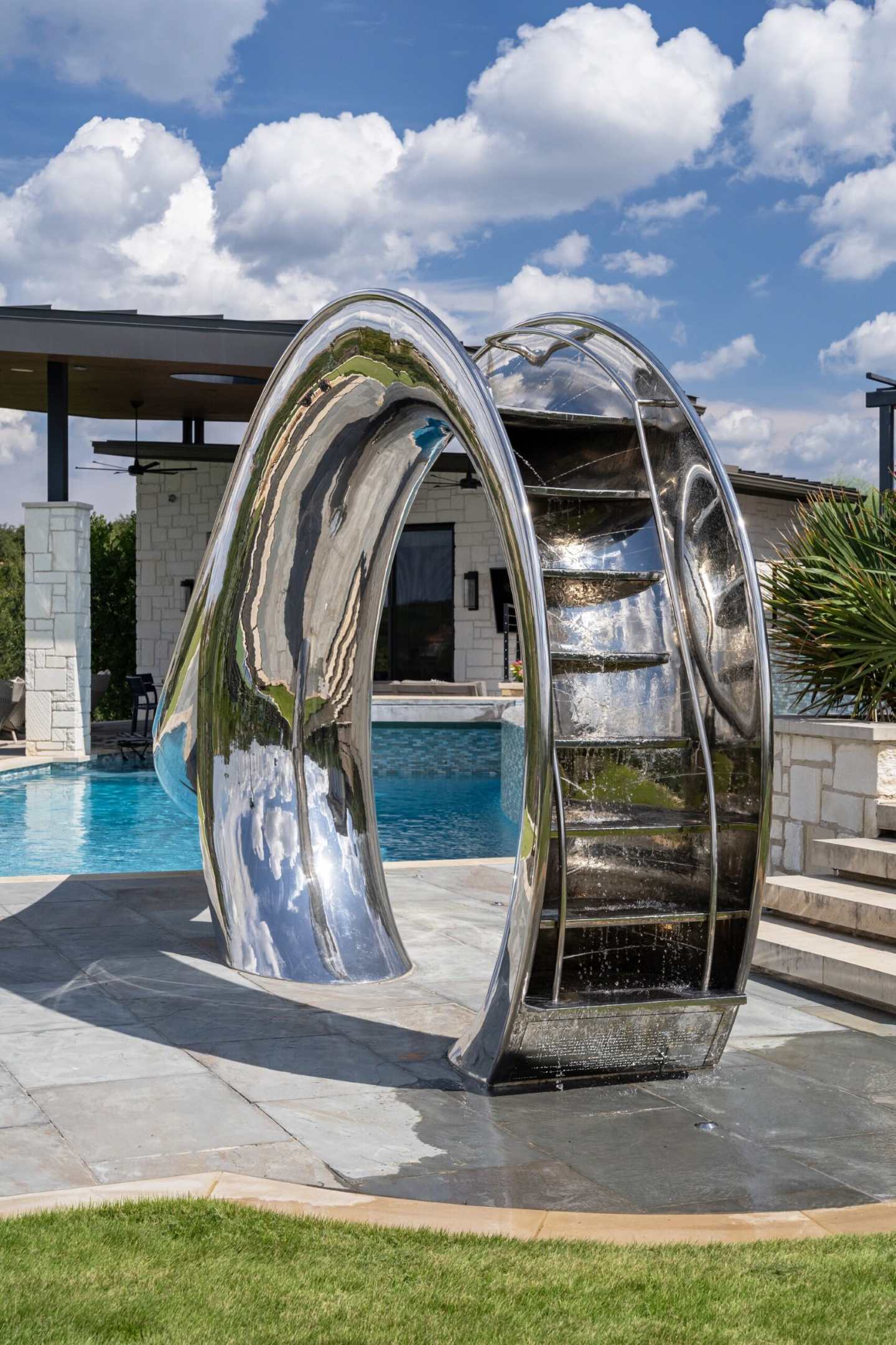Halo | cantilevered pool slide | by Splinterworks